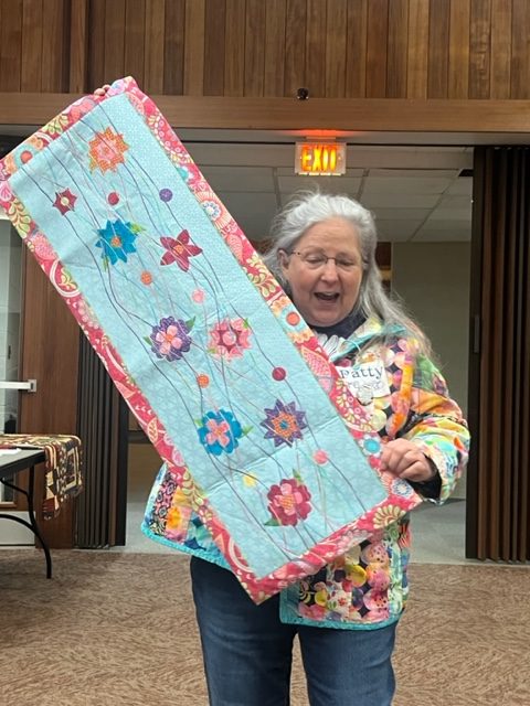Patty Martin-Table Runner (done with serger) – West Suburban Quilters ...